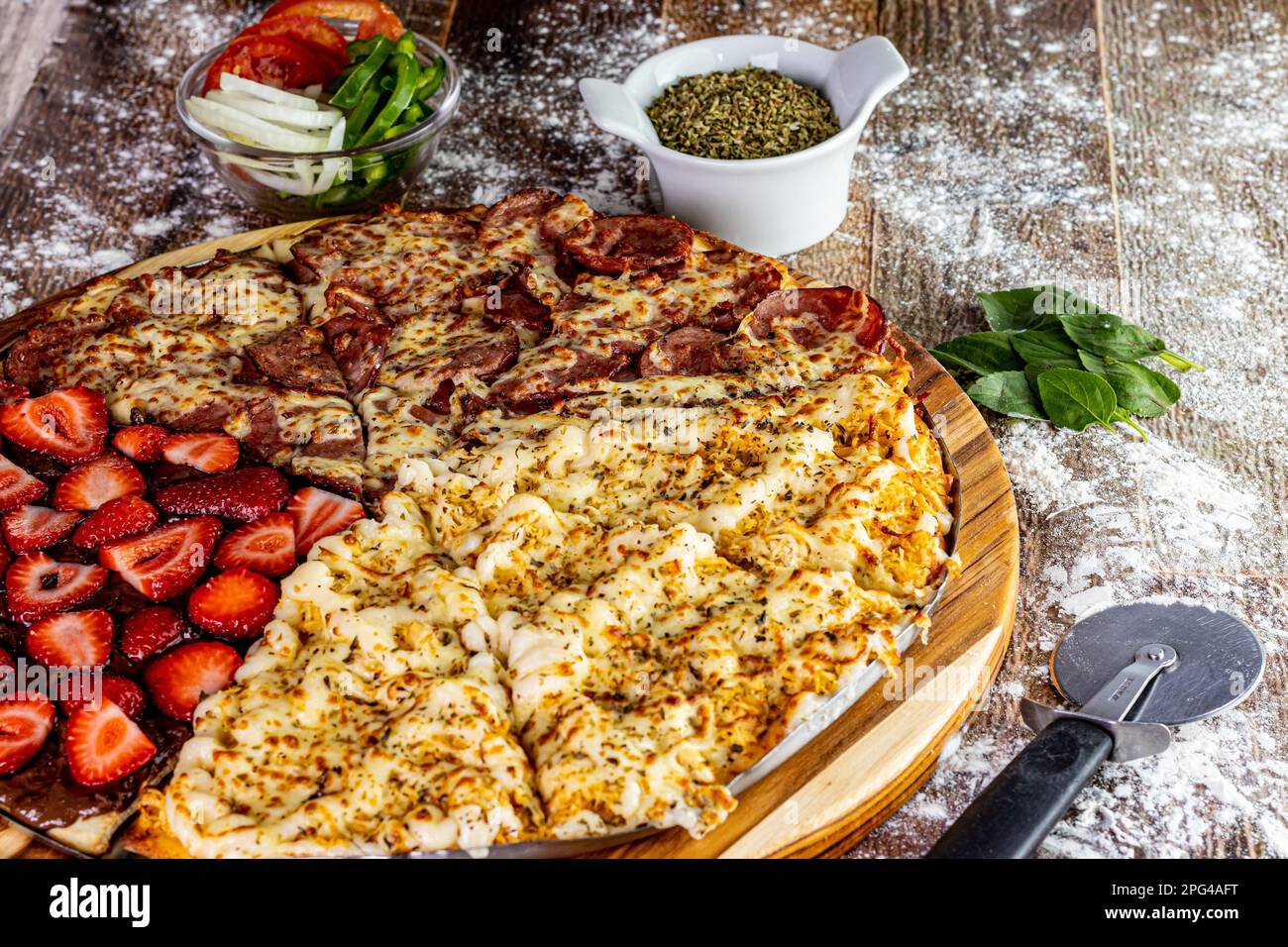 A freshly prepared pizza with assorted toppings, a topping of sliced ...