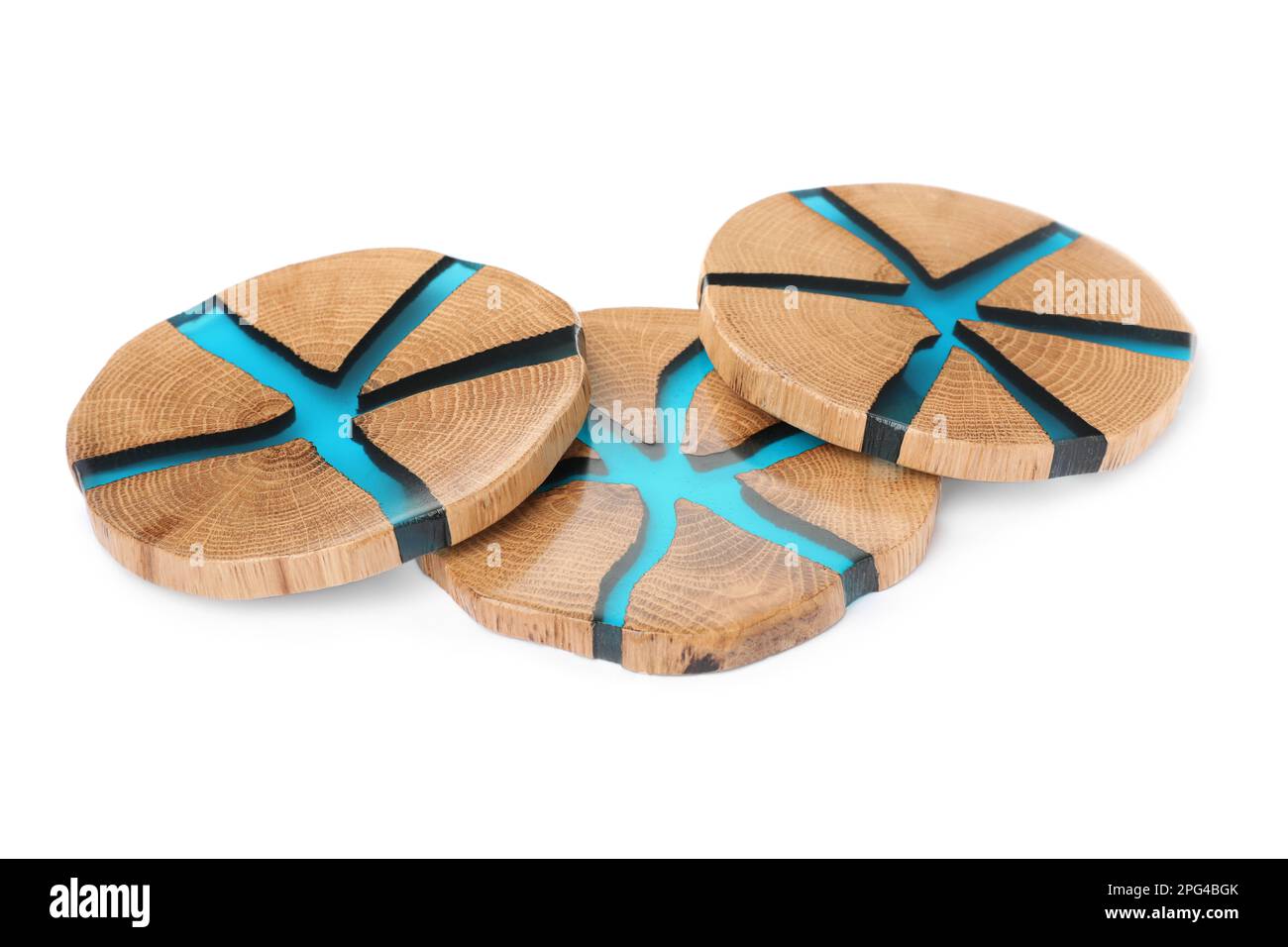 Stylish wooden cup coasters on white background Stock Photo - Alamy