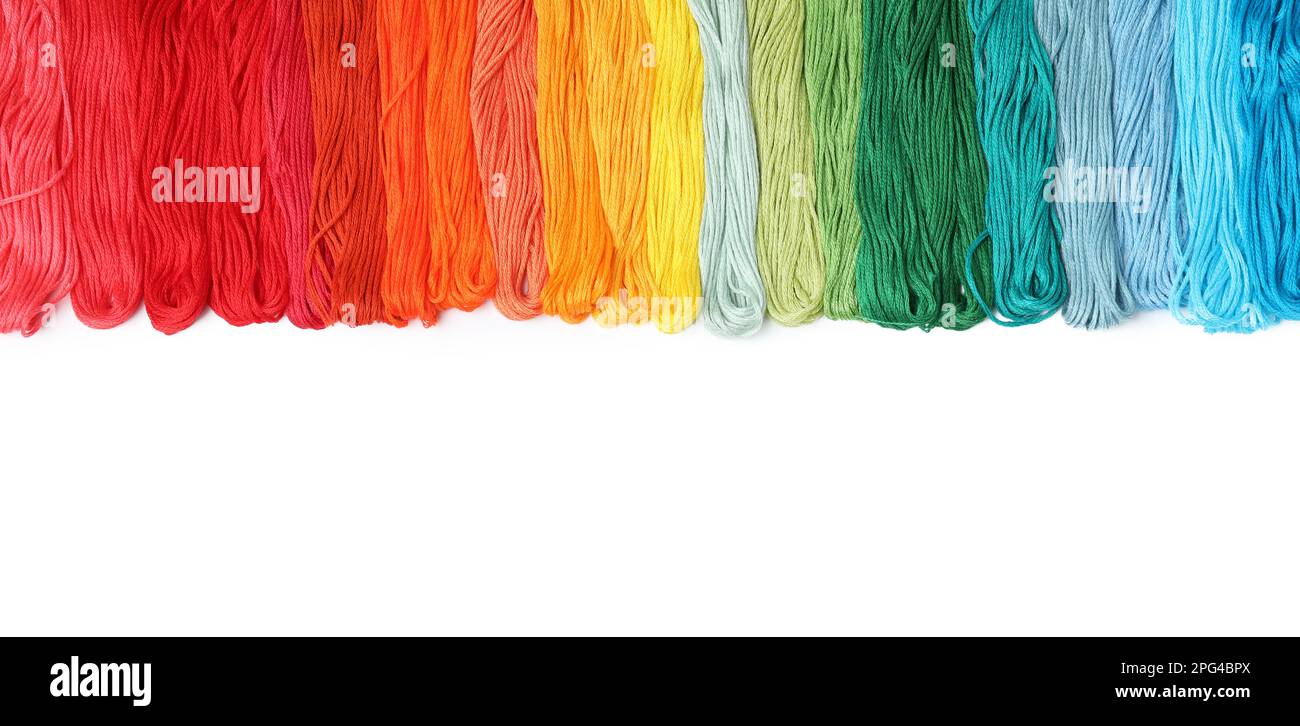 Set of colorful embroidery threads on white background, top view Stock ...