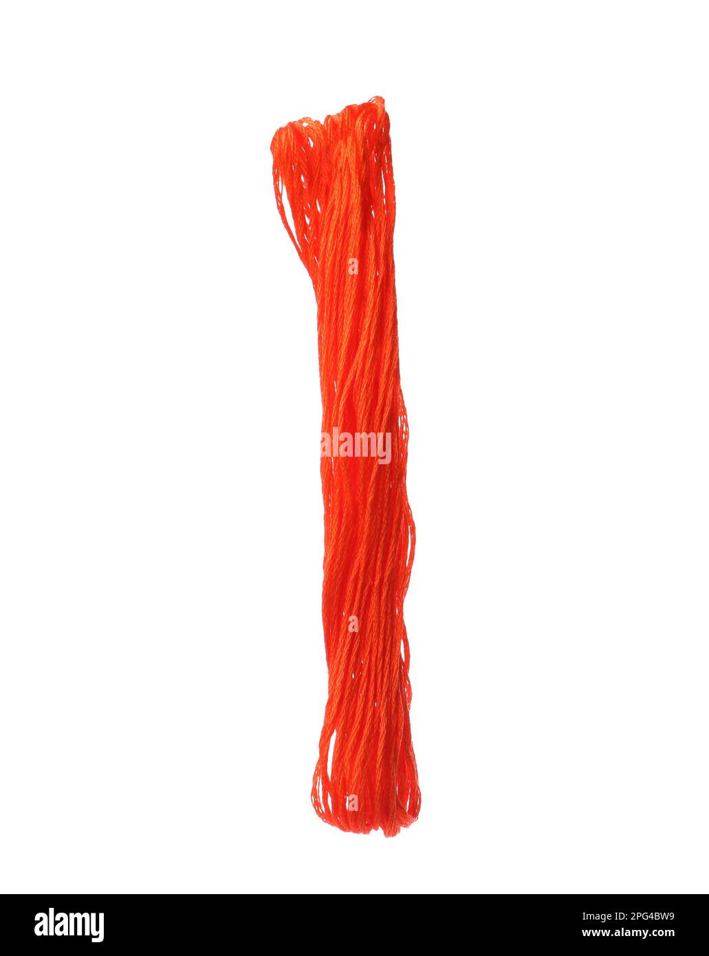Bright orange embroidery thread on white background Stock Photo - Alamy