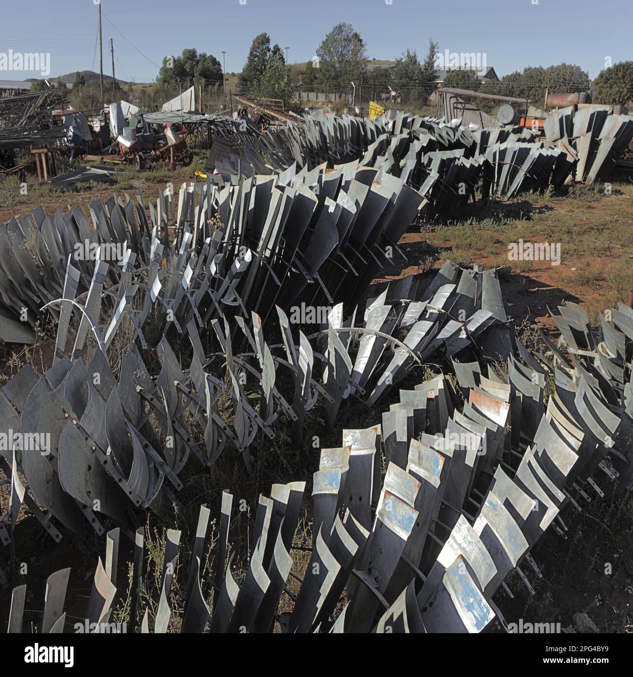 Galvanized iron windmill heads like in a metal dealer and scrapyard on ...