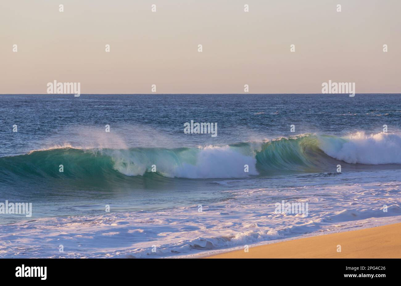 Blue wave on the beach. Dramatic natural background Stock Photo - Alamy