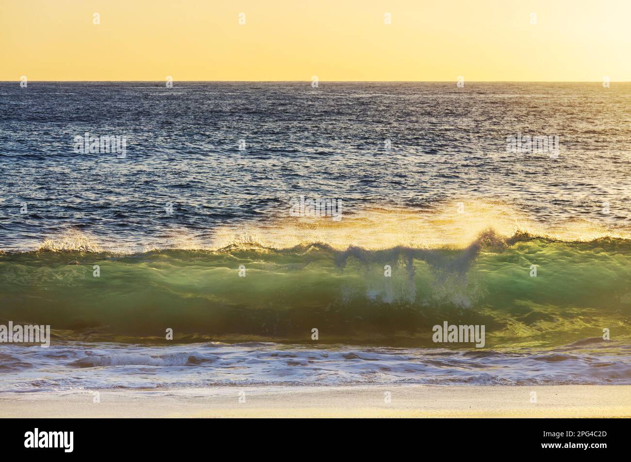 Blue wave on the beach. Dramatic natural background Stock Photo - Alamy
