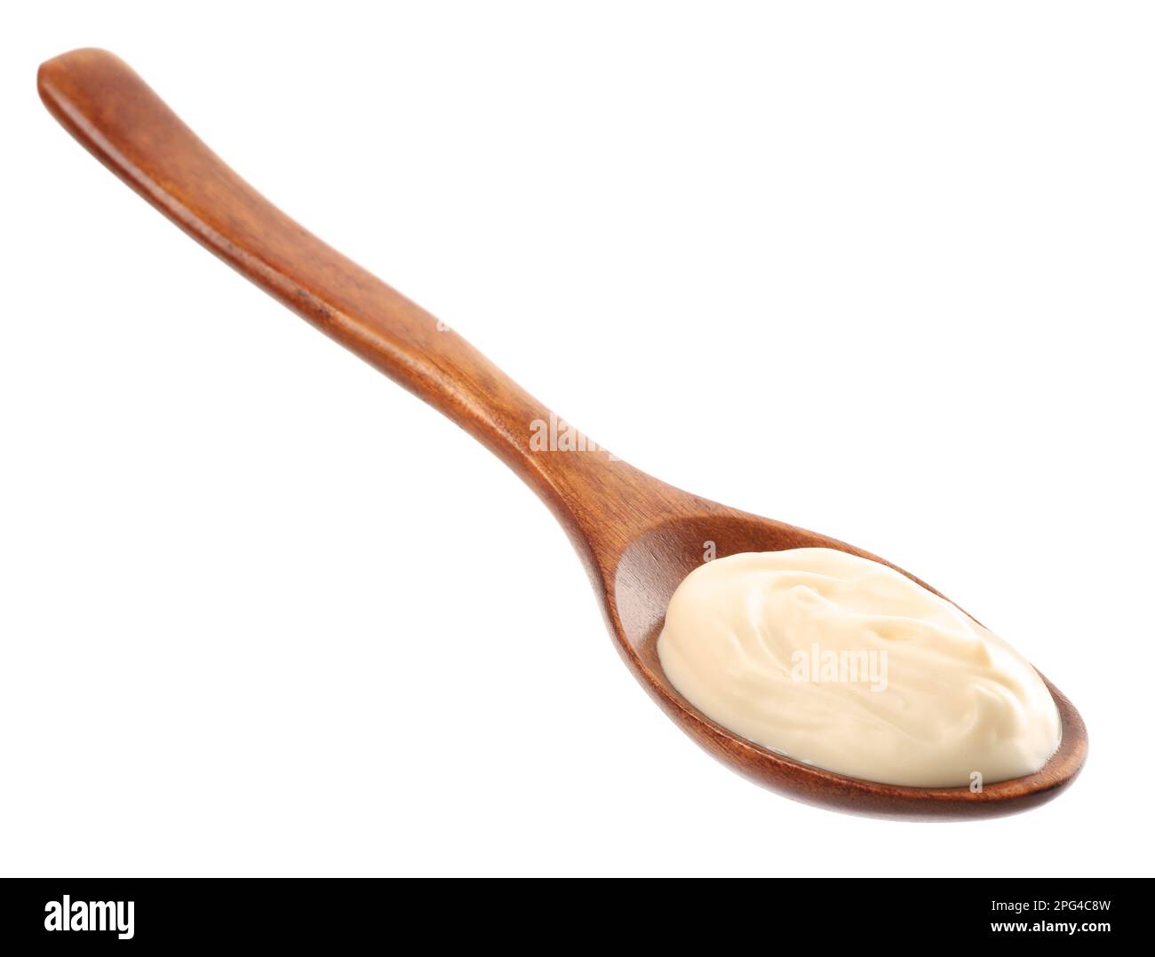 Wooden spoon with mayonnaise isolated on white Stock Photo - Alamy
