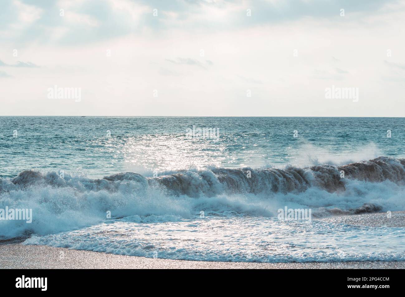 Blue wave on the beach. Dramatic natural background Stock Photo - Alamy