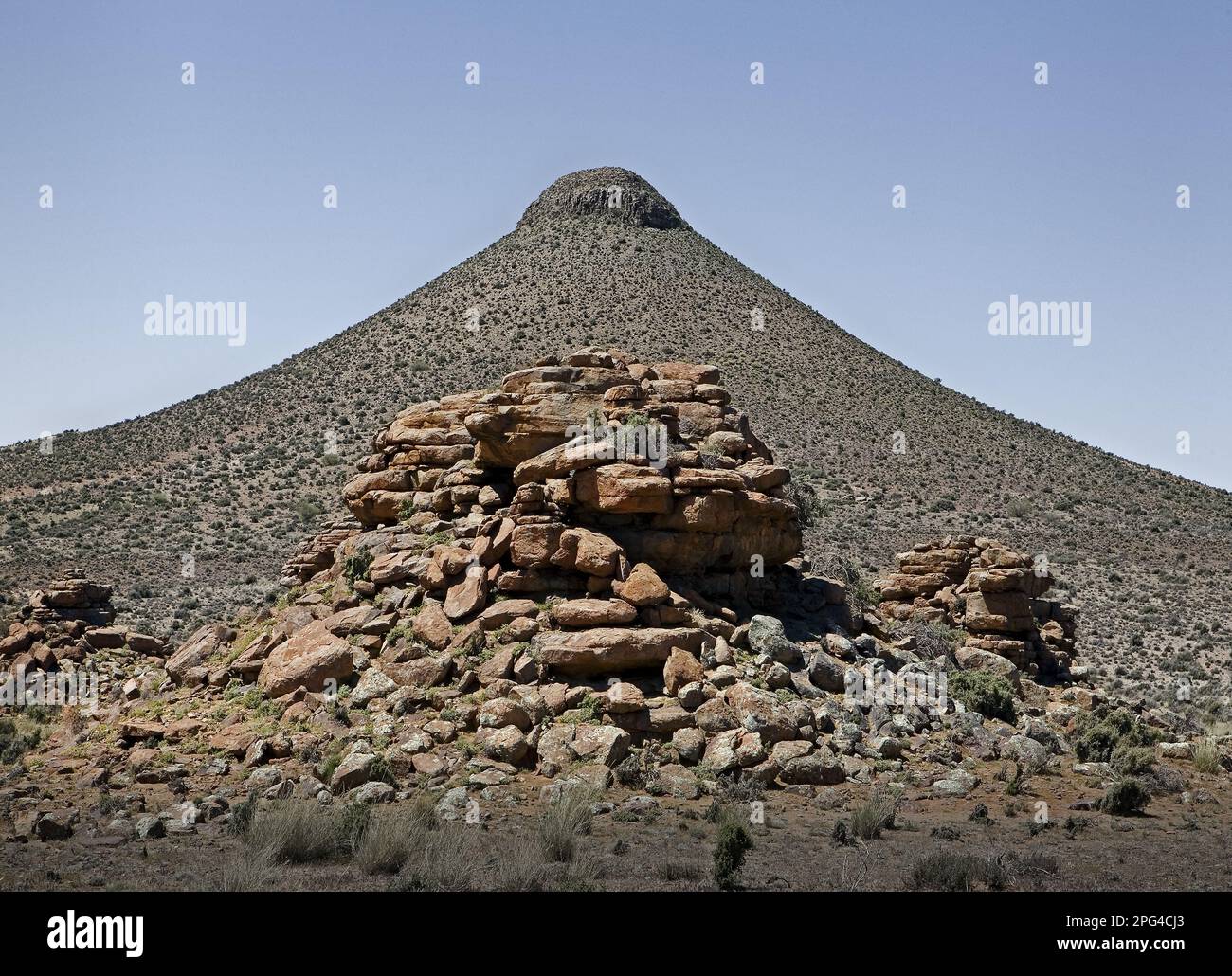 This typical symmetrical shape of a Karoo hill ( or 'Koppie' ) lies ...