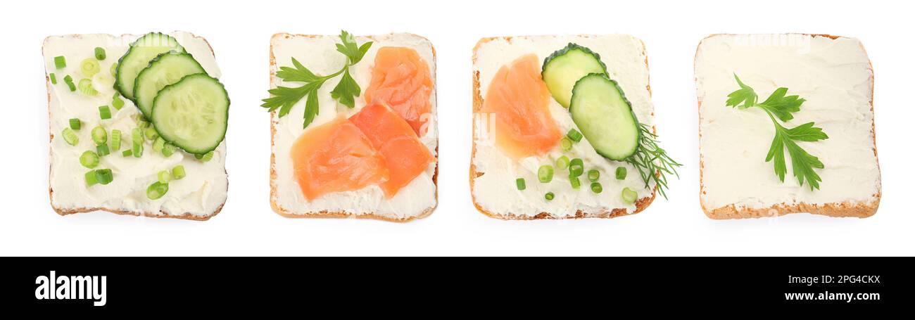 Top view of toasted bread with tasty cream cheese, salmon and cucumber ...
