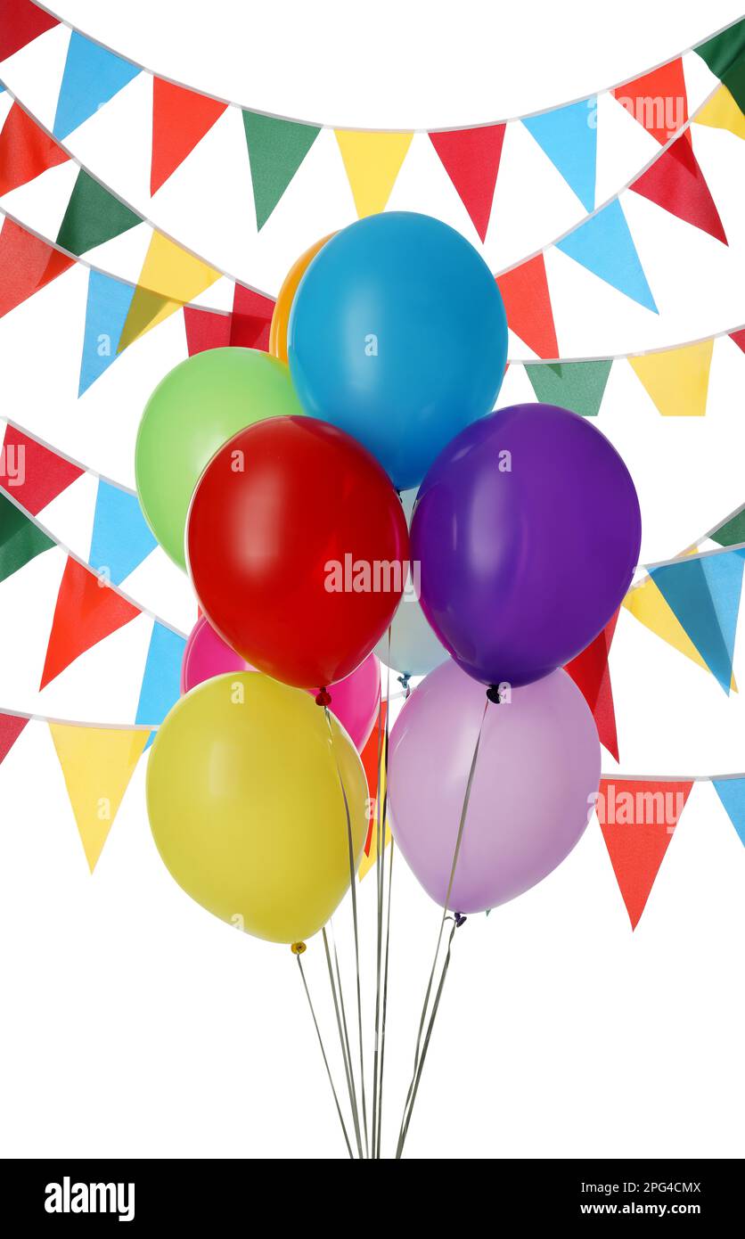Colorful balloons and decorative bunting flags on white background ...