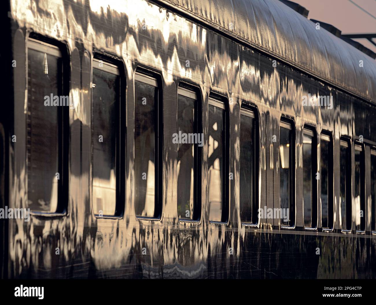 The reflections of a coach of the 'Rovos Rail' luxury train shine on ...