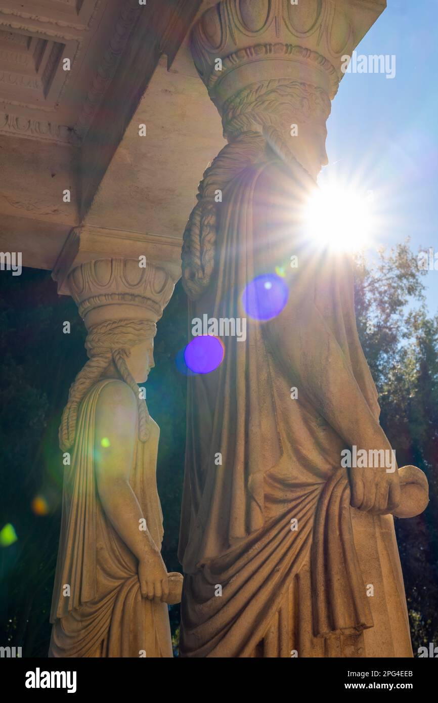 Patio with Statue Column in the Forest and Blue Clear Sky with Sunbeam ...