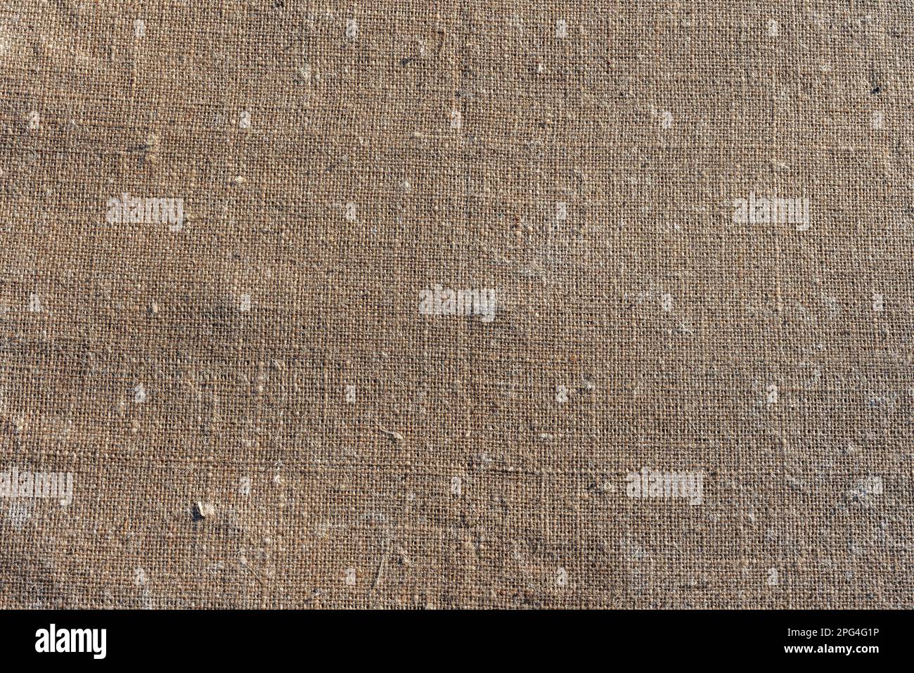Brown hessian linen texture background which could be used as an artist ...