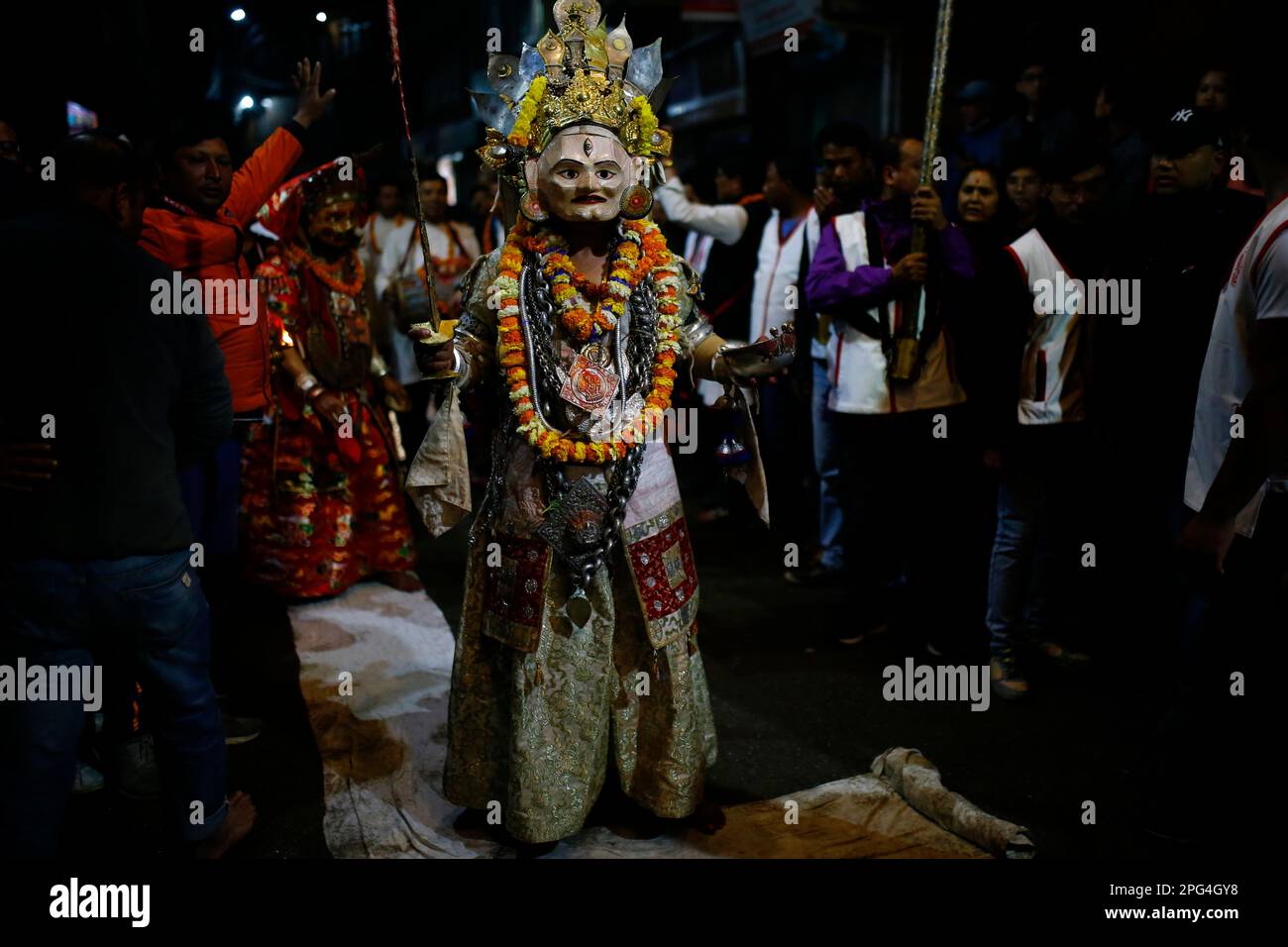 Kathmandu, Nepal. 20th Mar, 2023. A masked perform a ritual dance ...