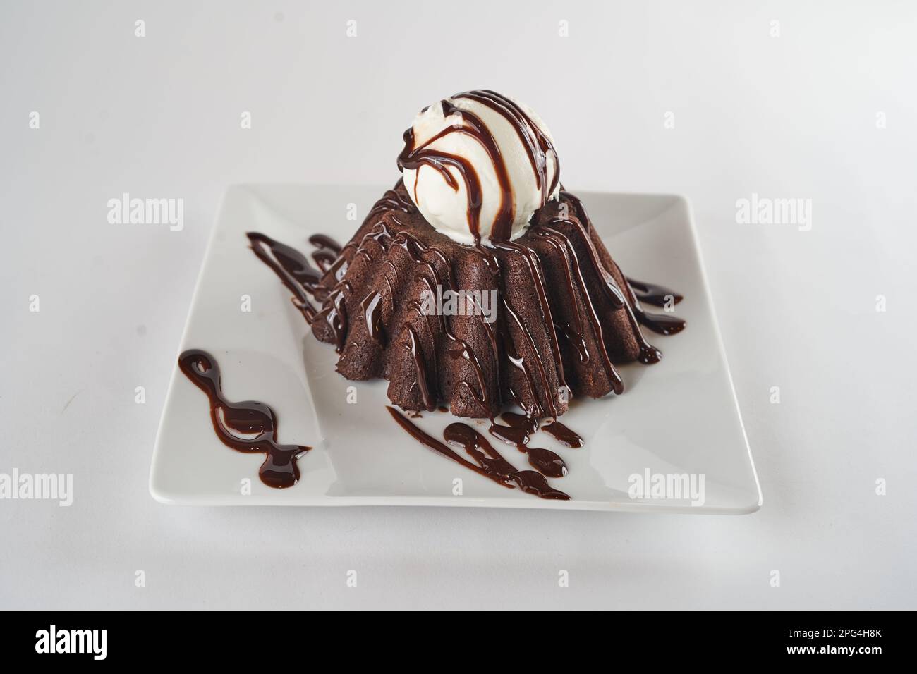 Molten cake in white dish Stock Photo - Alamy