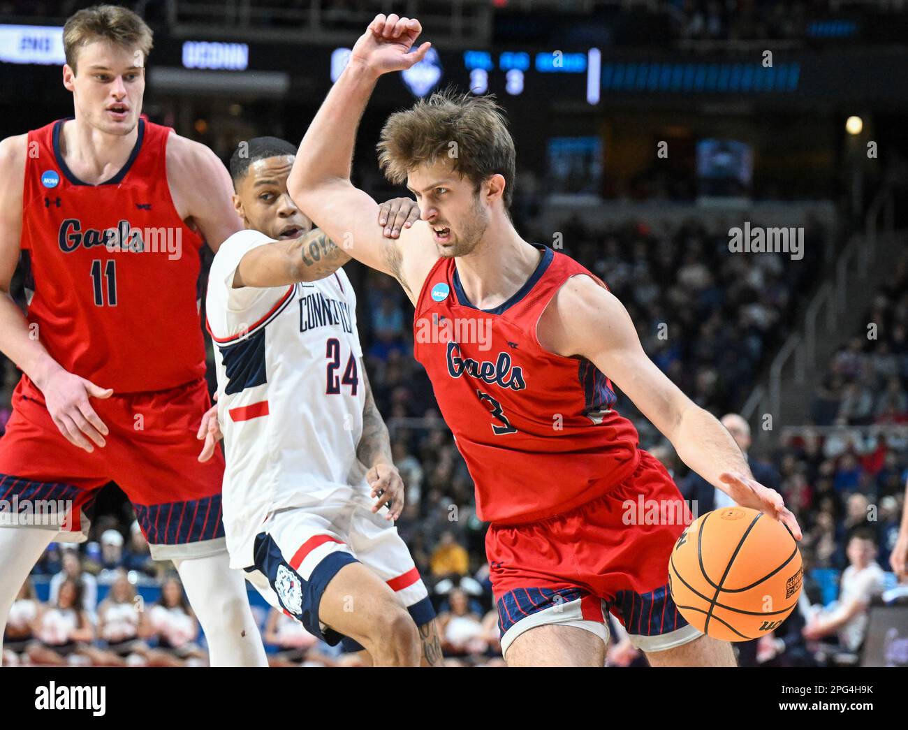 UConn guard Jordan Hawkins (24) fouls Saint Mary's guard Augustas ...