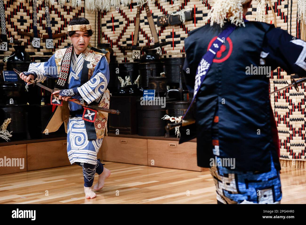 Shiraoi, Hokkaido, Japan. 16th Mar, 2023. Men dressed in traditional ...