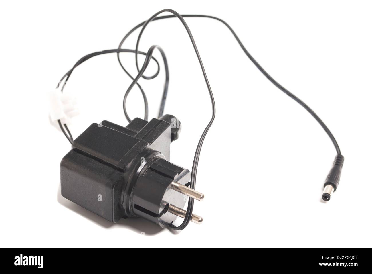Black power supply plug isolated on white background Stock Photo - Alamy