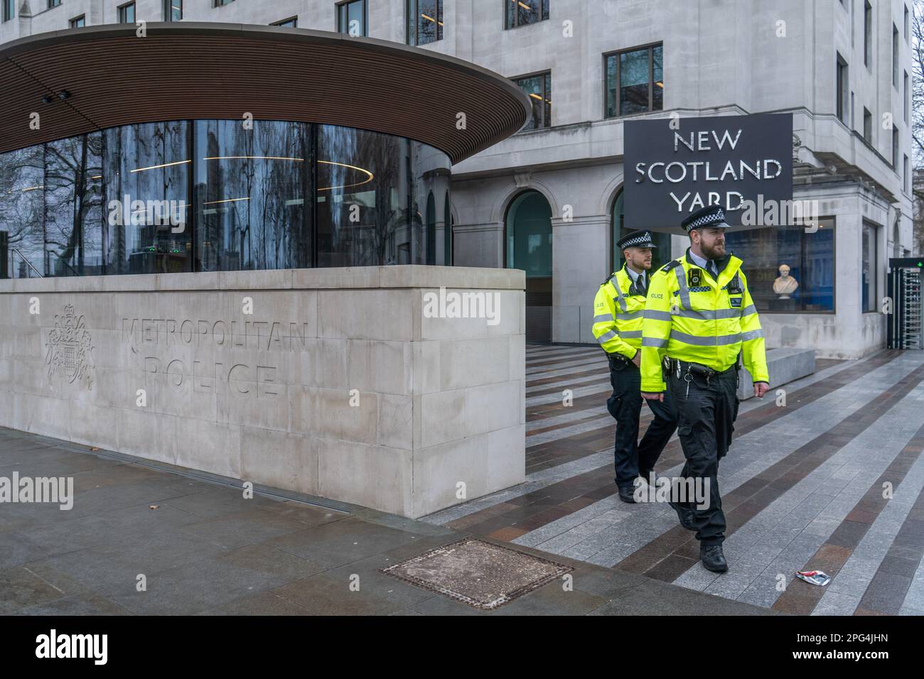 London, UK 20 March 2023. Police officers outside Scotland Yard ...