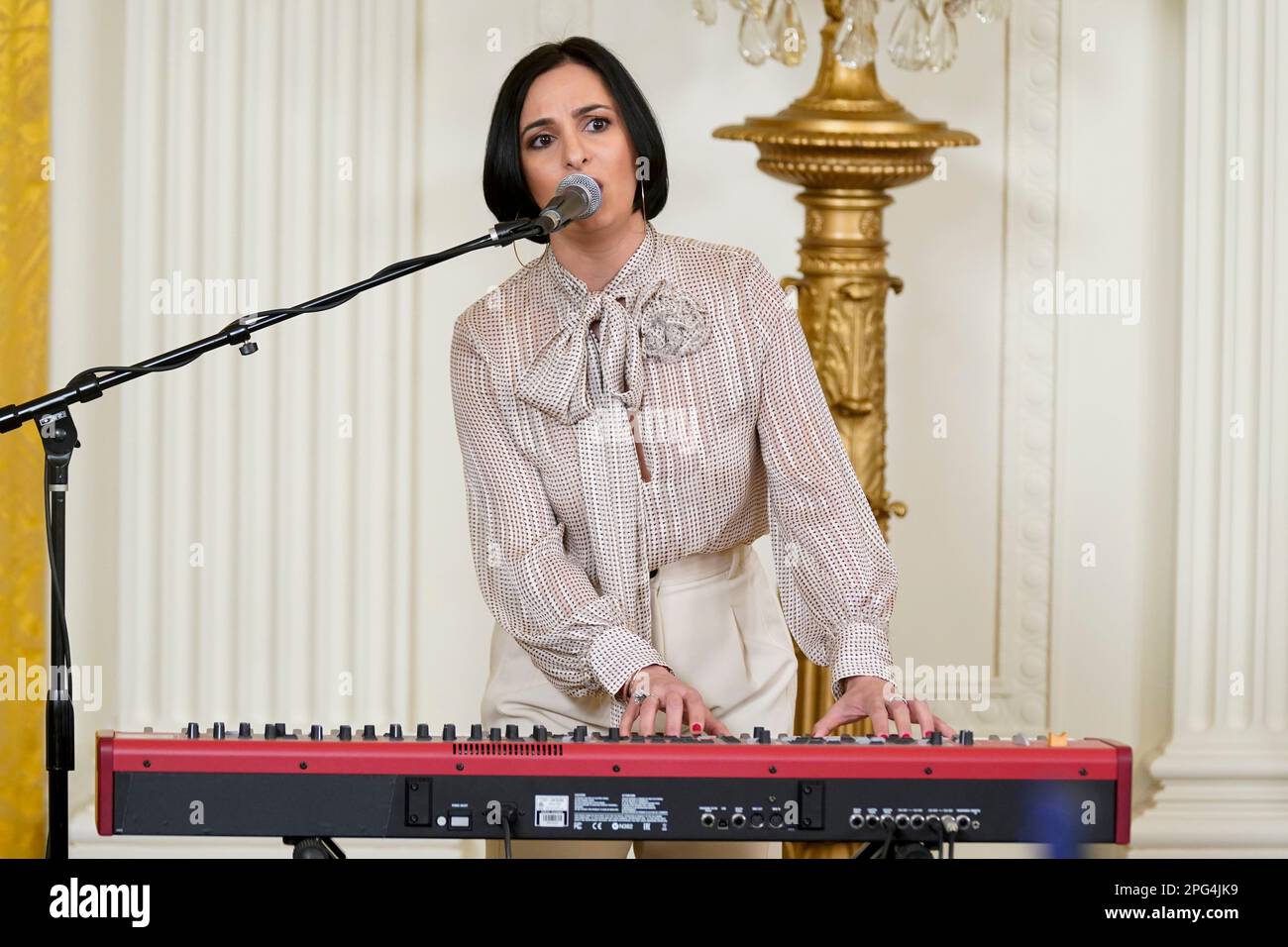 Rana Mansour, an Iranian-American singer-songwriter, performs during a ...