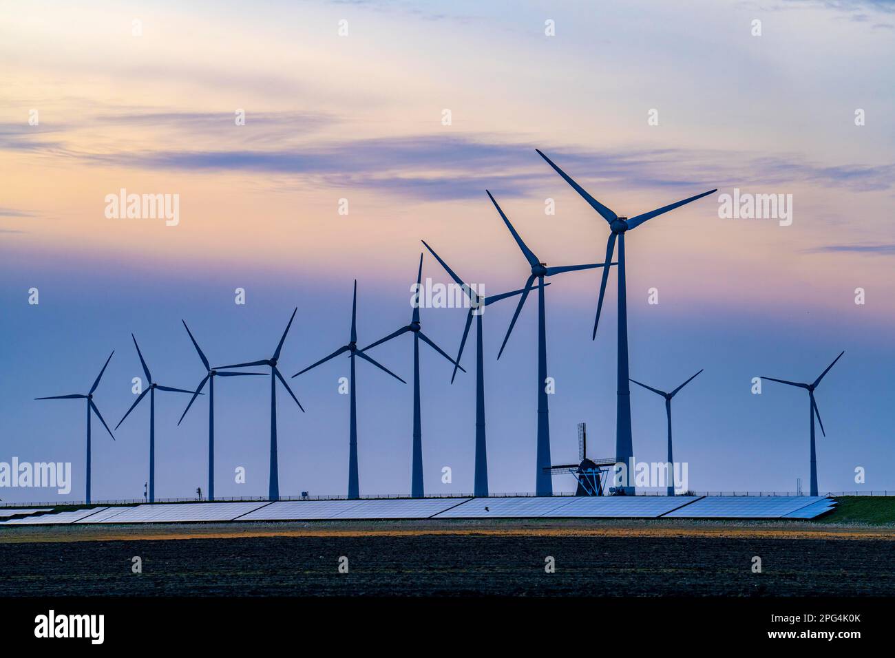Windmill Poldermolen De Goliath stands between the high-tech wind ...