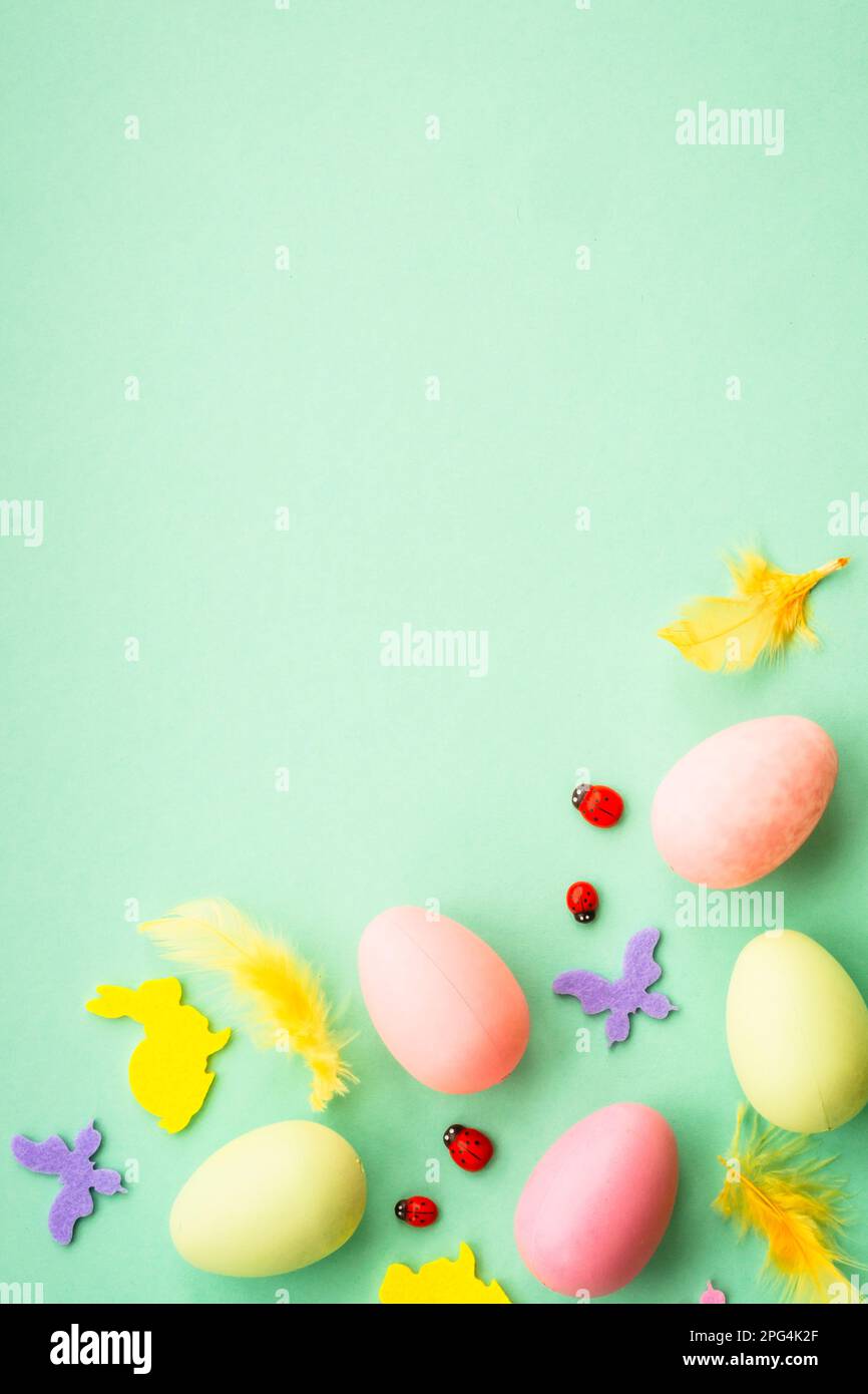 Easter background with Eggs, rabbit and spring flowers at green ...