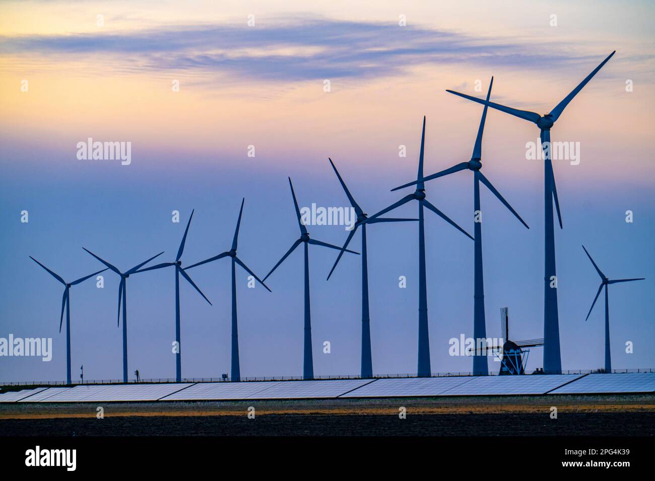 Windmill Poldermolen De Goliath stands between the high-tech wind ...