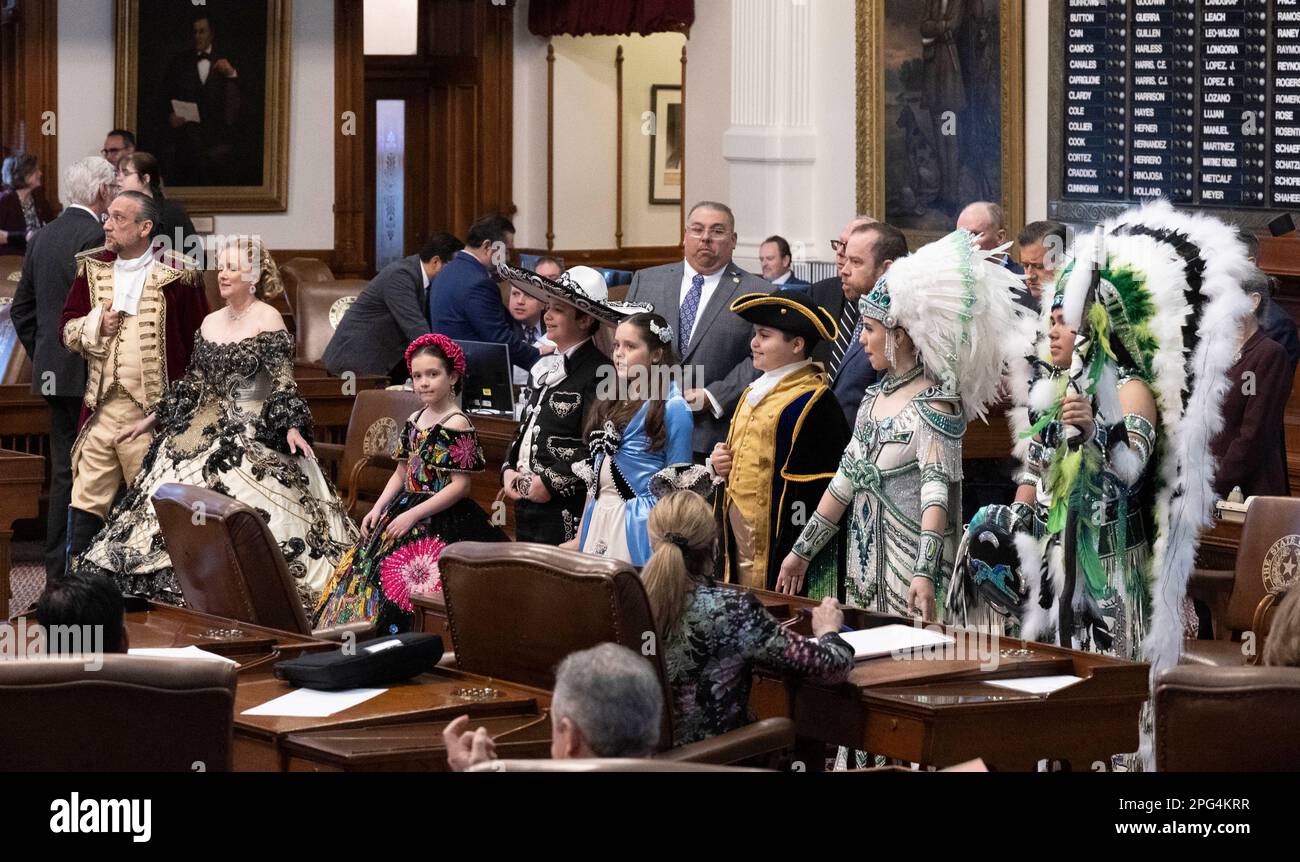 Texans from Laredo pose and parade through the Texas Capitol to promote ...