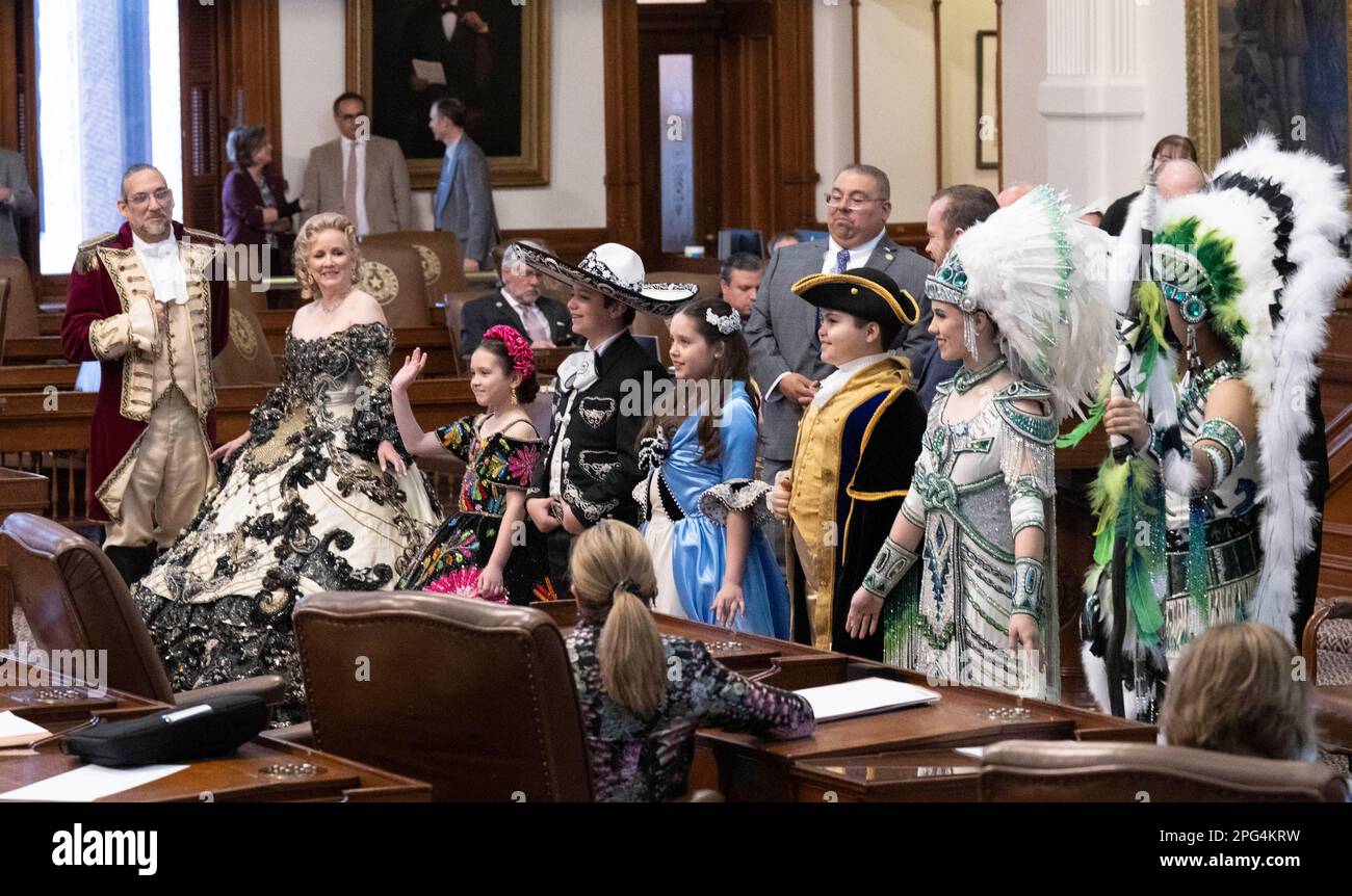 Texans from Laredo pose and parade through the Texas Capitol to promote ...