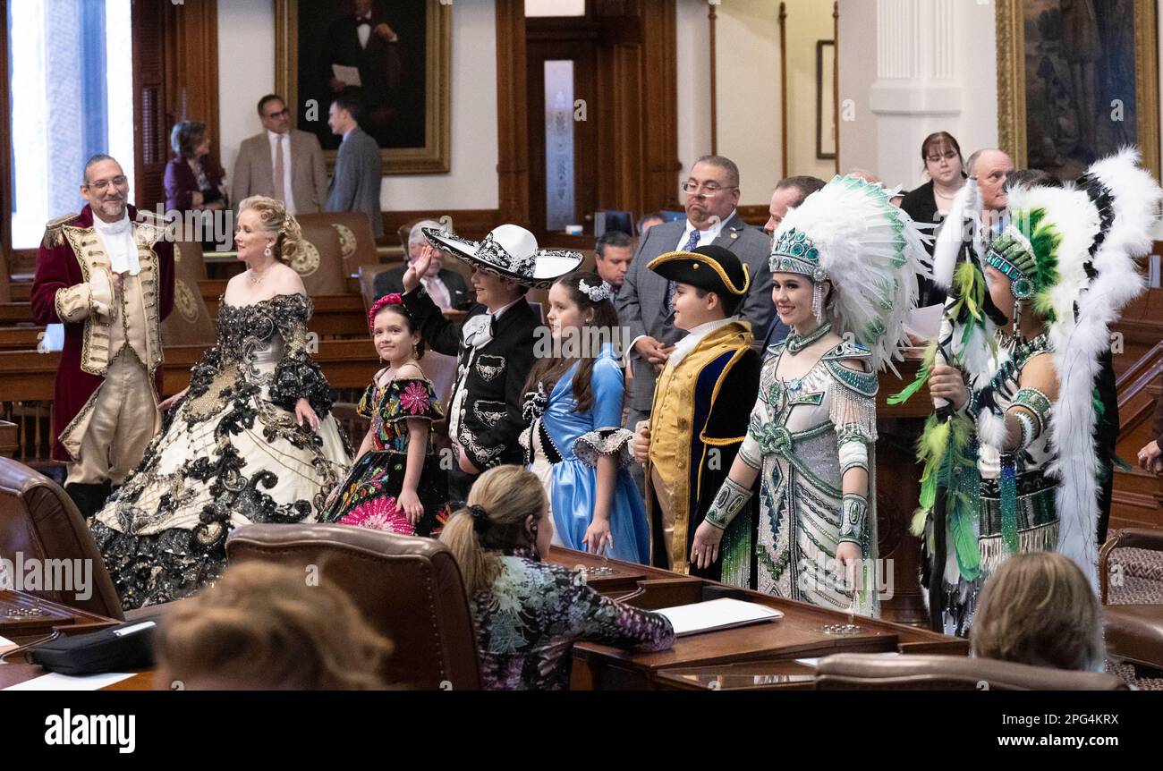 Texans from Laredo pose and parade through the Texas Capitol to promote ...