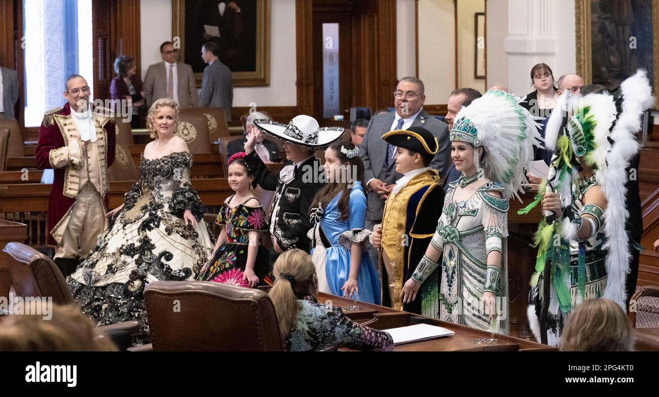 Texans from Laredo pose and parade through the Texas Capitol to promote ...