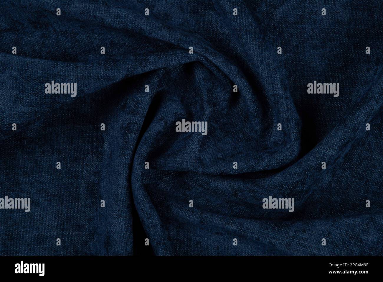 Blue fabric texture - top view and close-up of a piece of crushed and ...