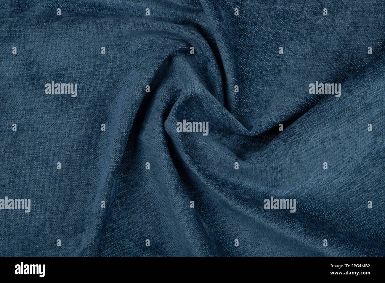 Blue fabric texture - top view and close-up of a piece of crushed and ...