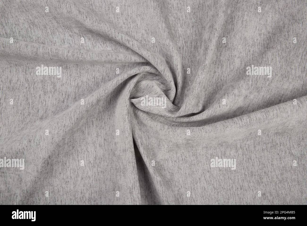 Gray fabric texture - top view and close-up of a piece of crushed and ...