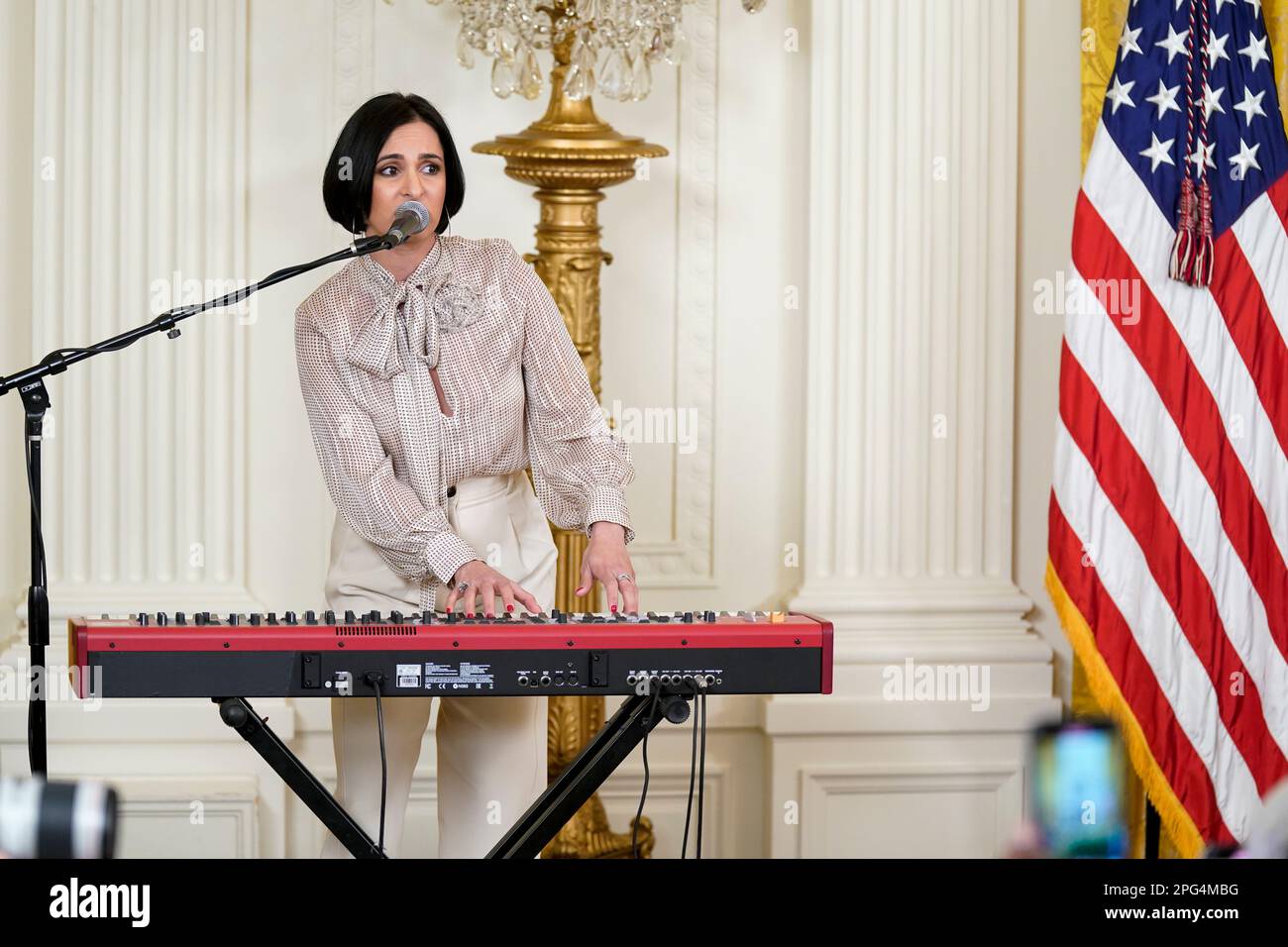 Rana Mansour, an Iranian-American singer-songwriter, performs during a ...