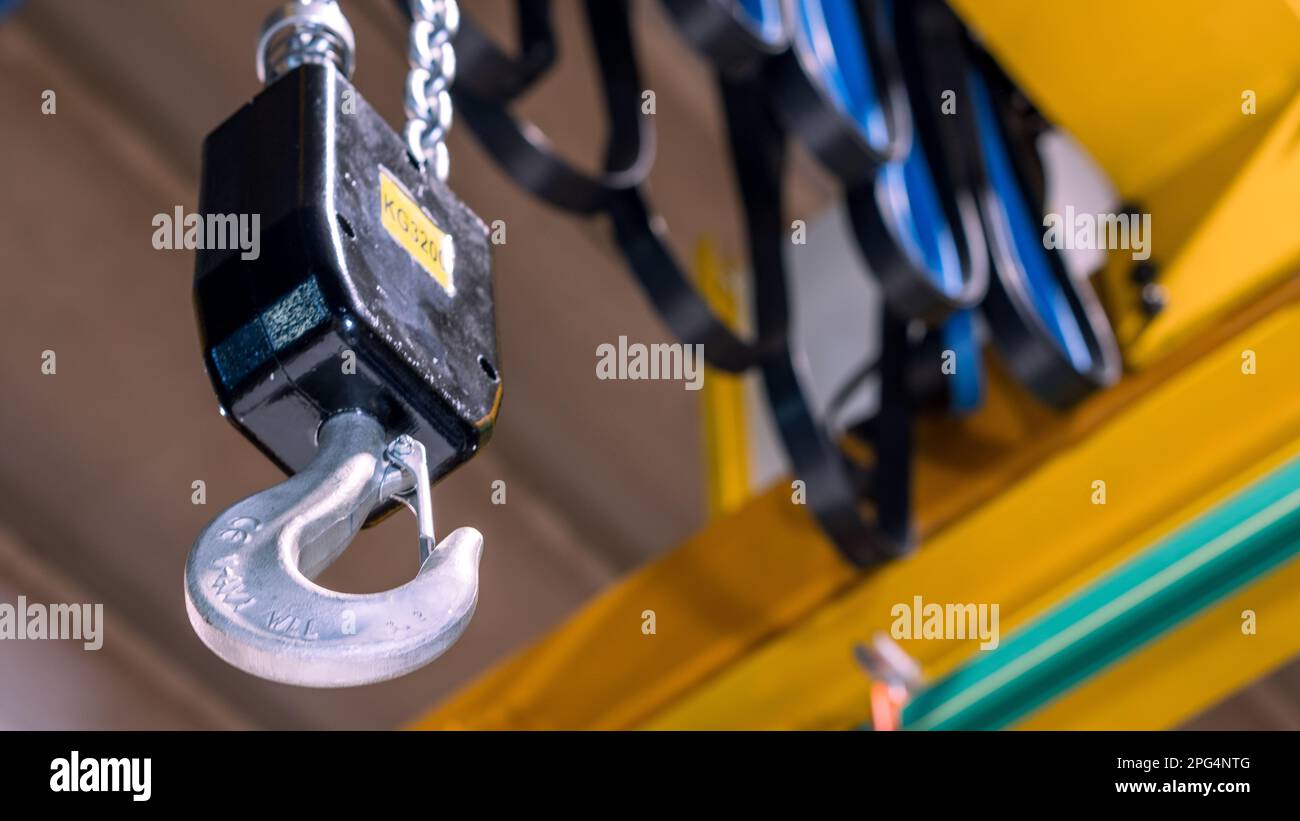 Crane hook inside factory building, industrial background. focus on the crane hook Stock Photo ...
