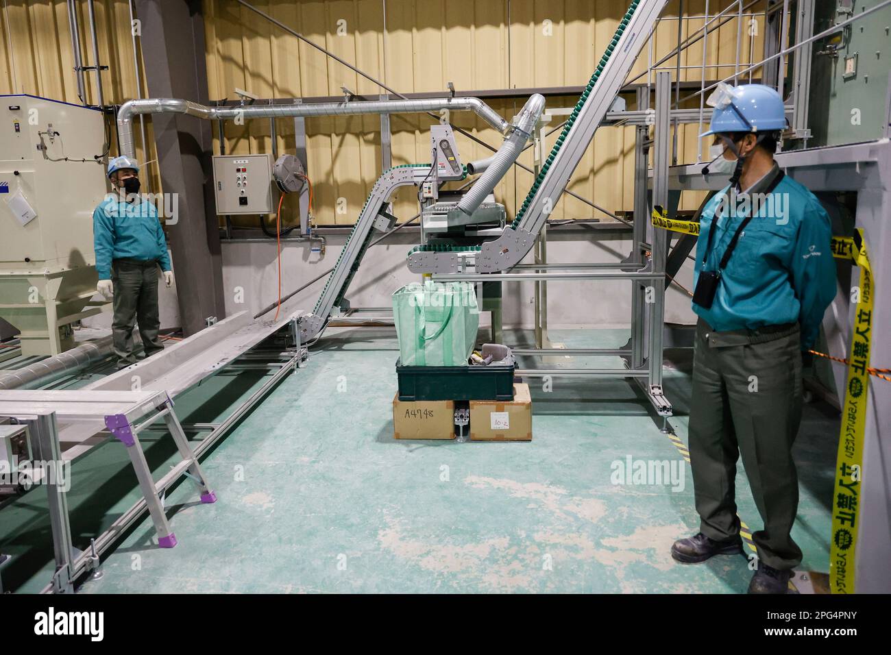 March 17, 2023, Sapporo, Hokkaido, Japan: Members of staff monitor the ...