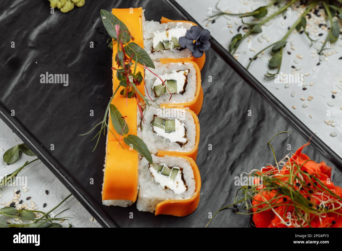 Rainbow Sushi Roll with salmon, eel, tuna, avocado, royal prawn, cream ...