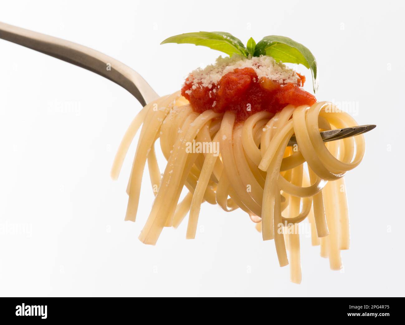 fork with spaghetti and tomato sauce isolated on white background Stock ...
