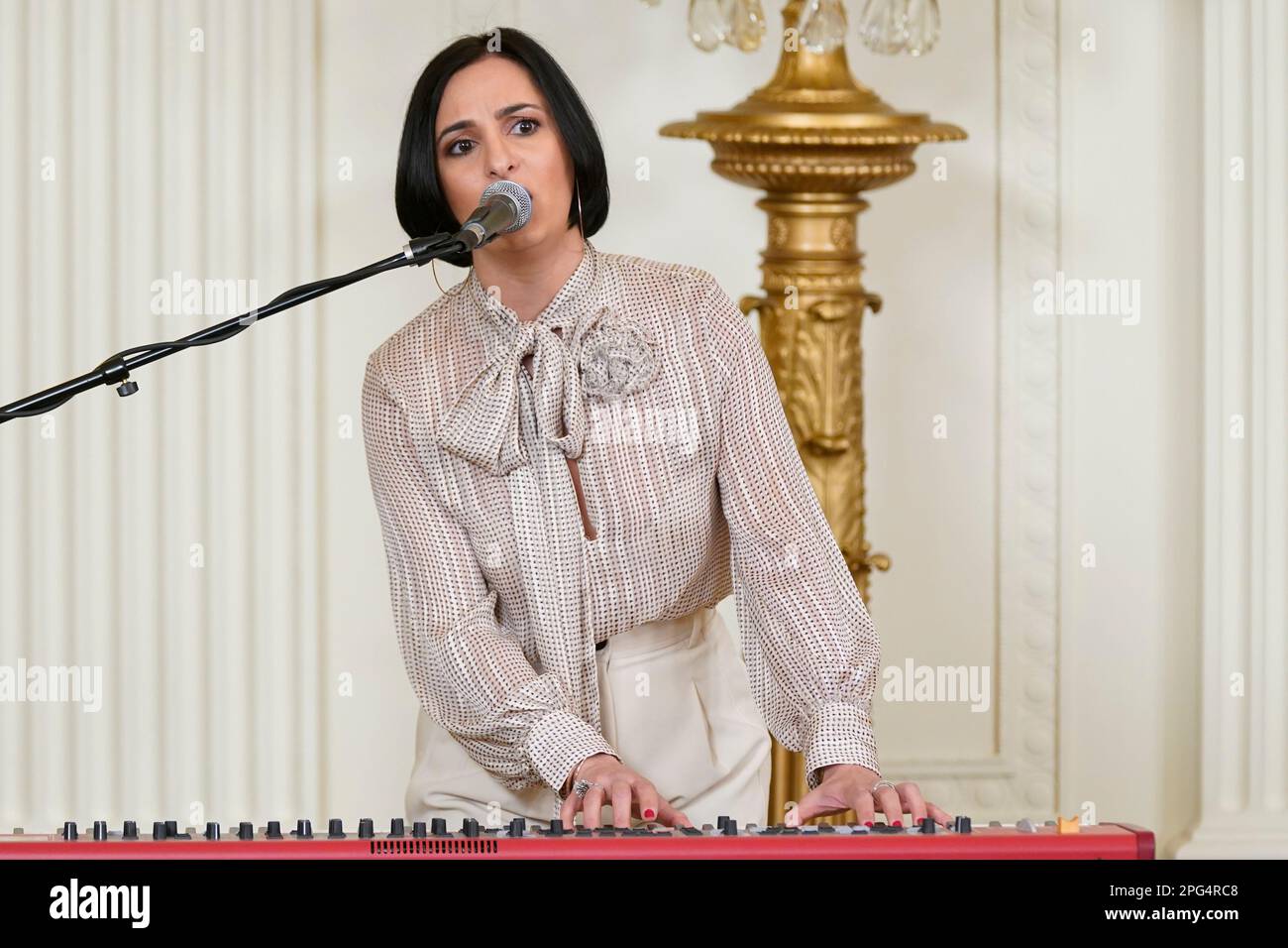 Rana Mansour, an Iranian-American singer-songwriter, performs during a ...
