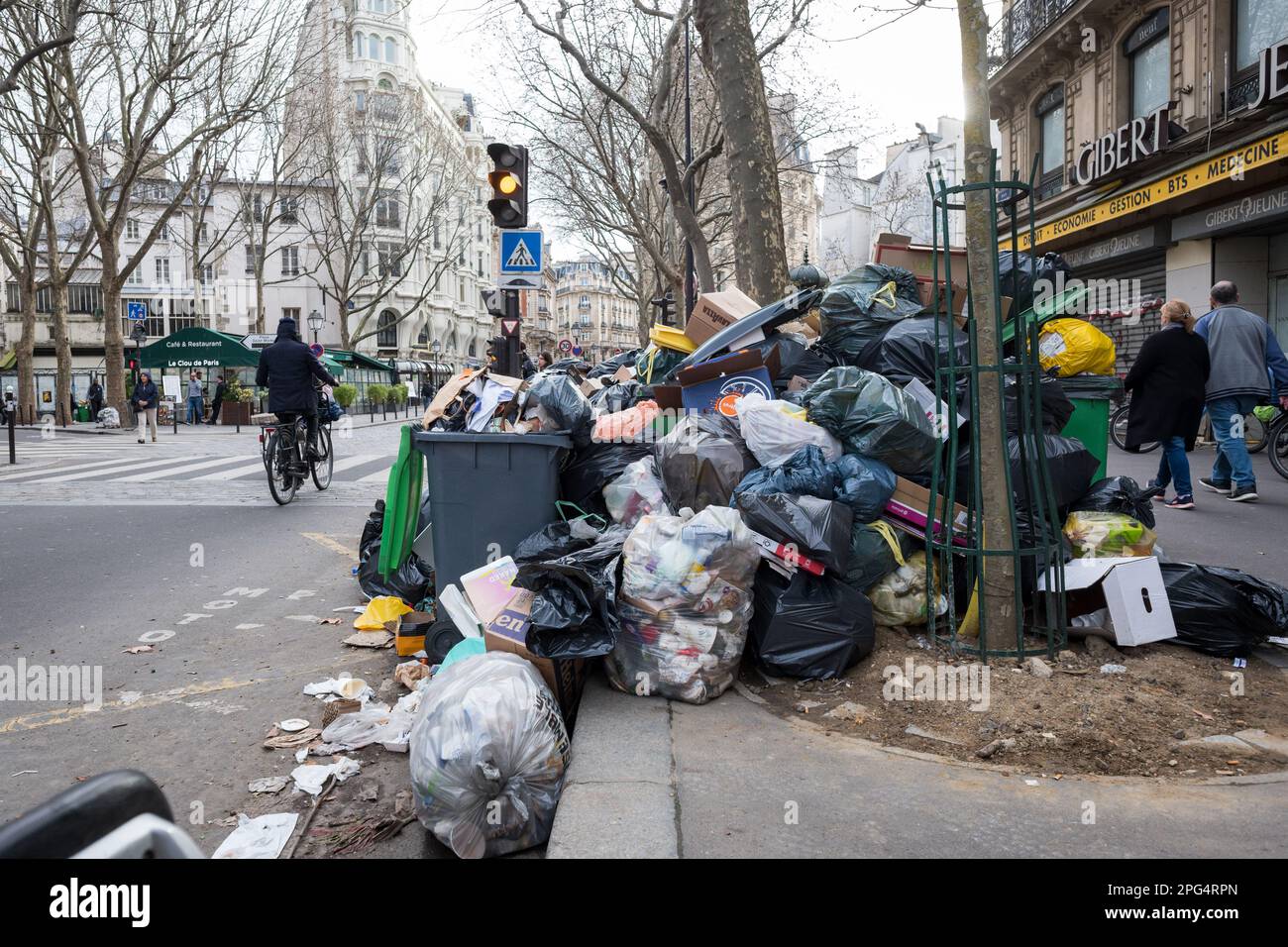 Paris, France, 03/20/2023. Tons of garbage piling up on sidewalk in a Paris street during the ...