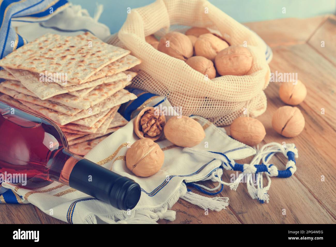 Passover celebration concept. Matzah, red kosher and walnut ...