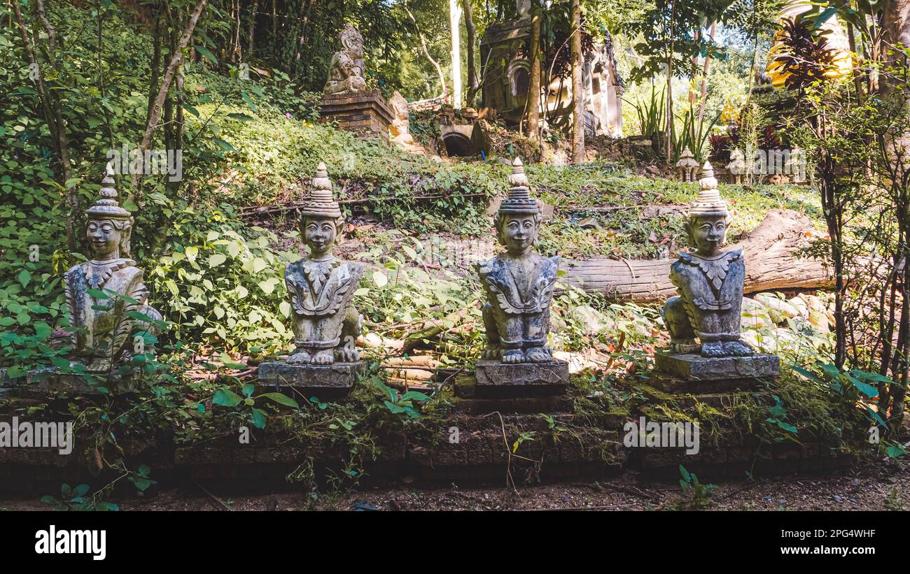 A group of statues in Buddhist Wat Palad, Pha Lat Wat Sakithaka, Forest ...