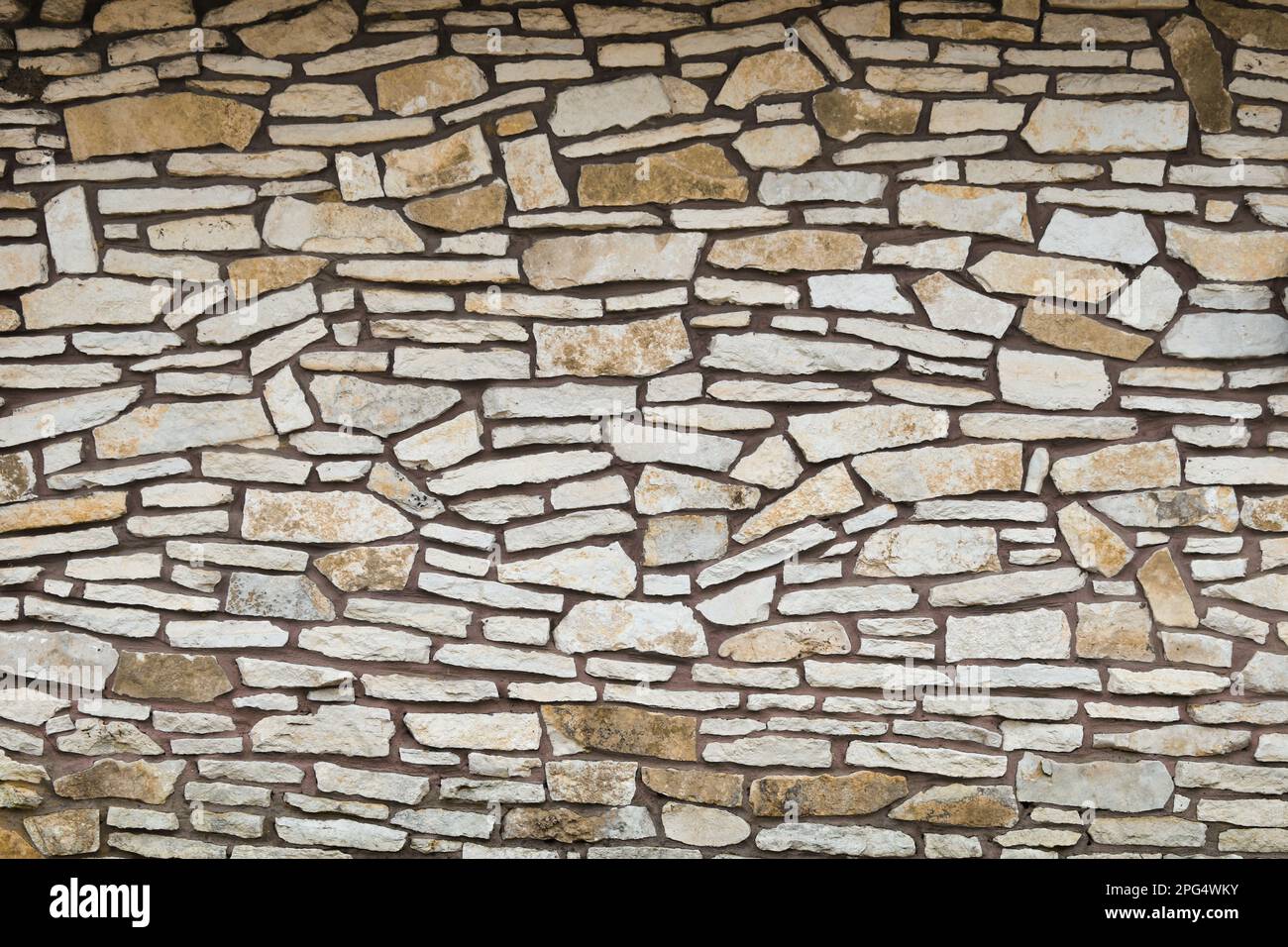 Rock stone wall building siding Stock Photo - Alamy