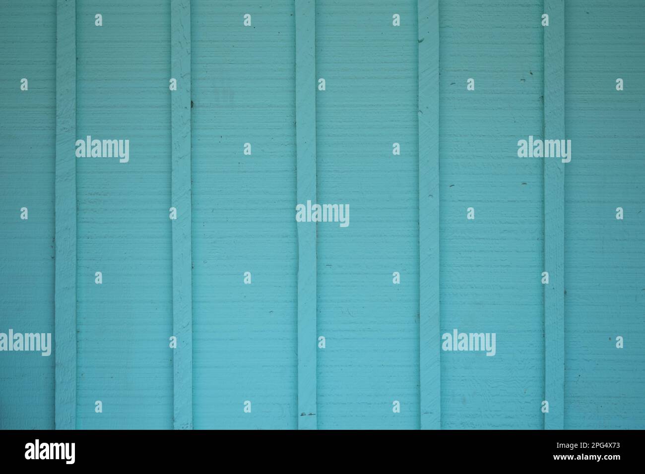 Blue batten accent white wood wall Stock Photo - Alamy