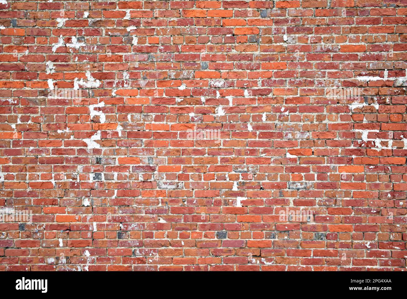 Red Brick Wall Repaired Patches Stock Photo - Alamy