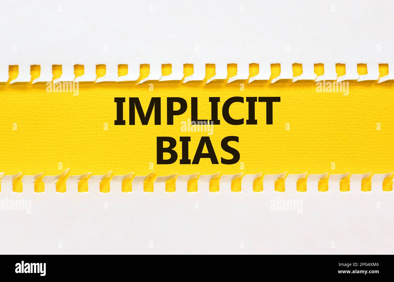 Implicit bias symbol. Concept words Implicit bias on yellow paper ...