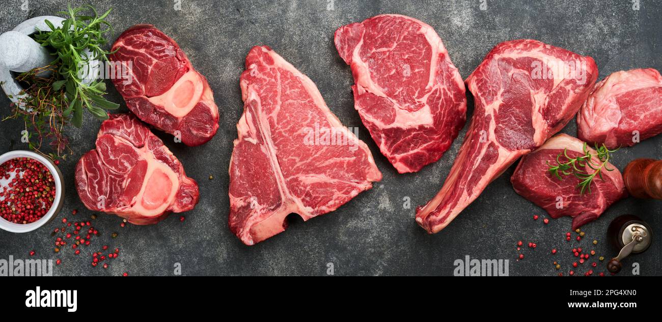 Raw prime steaks. Variety of fresh black angus prime meat steaks T-bone ...