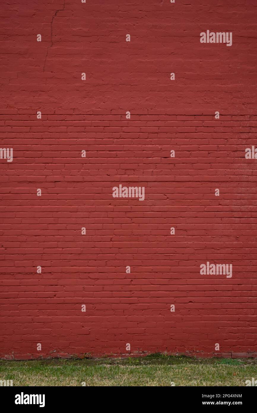Dark red brick green grass Stock Photo - Alamy