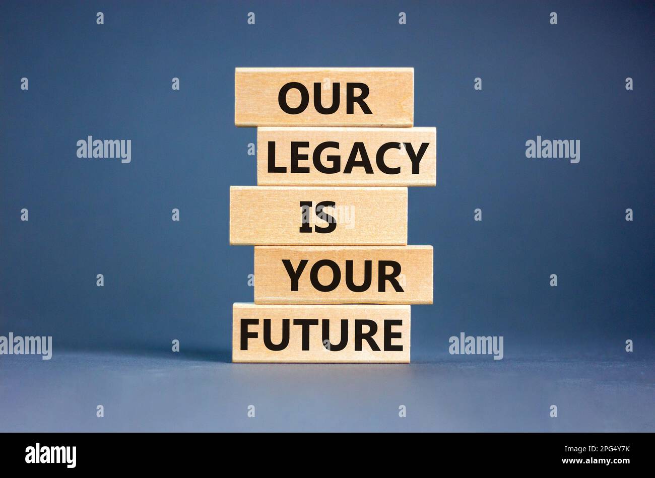 Legacy and future symbol. Concept words Our legacy is your future on wooden blocks. Beautiful ...