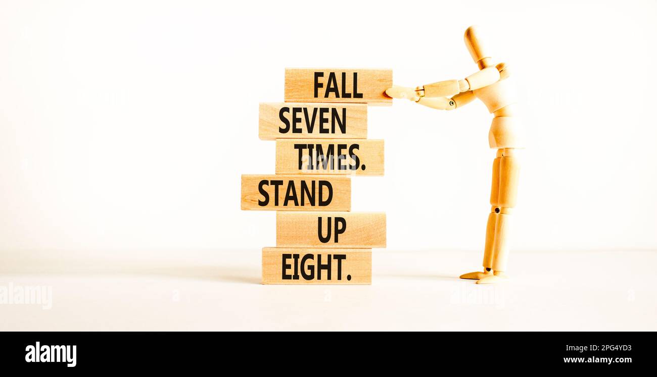 Stand up symbol. Concept words Fall seven times stand up eight on ...