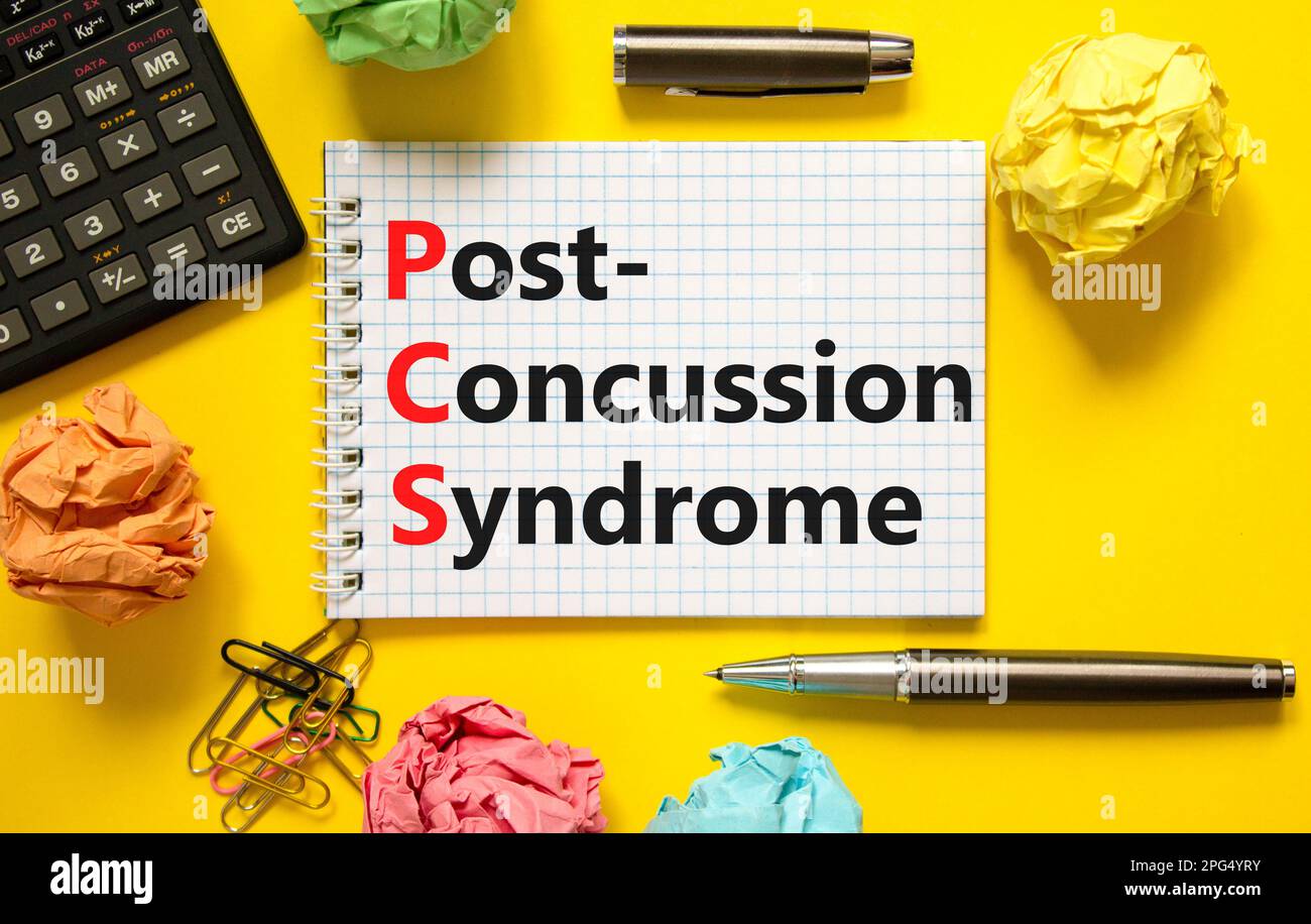 PCS post-concussion syndrome symbol. Concept words PCS post-concussion syndrome on white note on ...